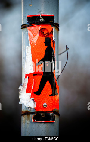 orange man walking sign signpost image Stock Photo - Alamy