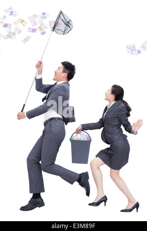 Chinese business partners catching money with butterfly net Stock Photo ...