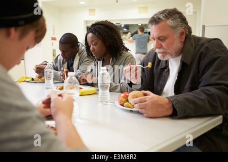 Homeless people waiting for food in front of the general post office ...