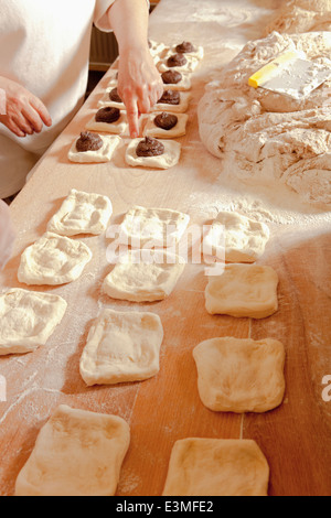 Professional Bakery - Baker Making Sweet Pastry Stock Photo - Alamy