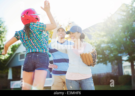 Family playing a game Stock Photo - Alamy
