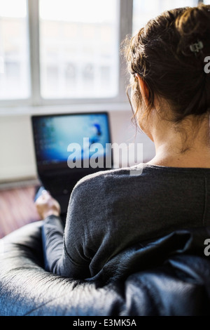 Middle age caucasian businesswoman using touchpad working at the office ...