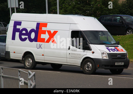 FedEx white Ford Transit van, UK Stock Photo - Alamy