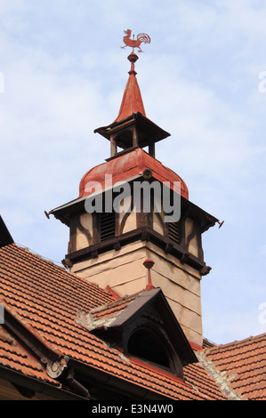 Old traditional rooftop chimney constructed of bricks on a traditional ...