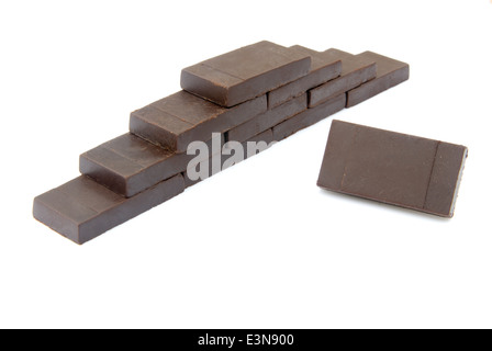 Chocolate blocks on white background Stock Photo - Alamy