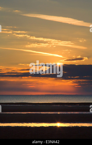 Sun setting over the Wash , Hunstanton, Norfolk, UK Stock Photo - Alamy