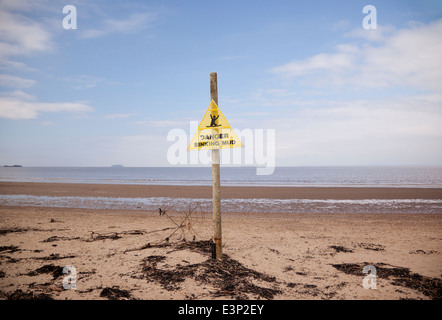 Danger Sinking Mud warning sign on the beach at Weston-Super-Mare in ...