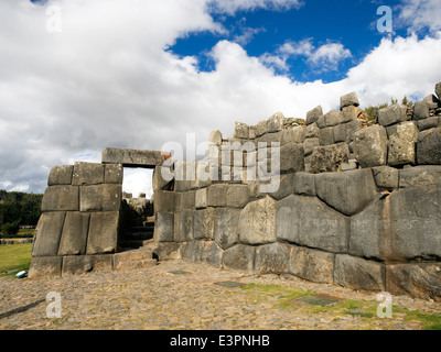 Large polished dry stone walls of the Saksaywaman military Inca complex ...