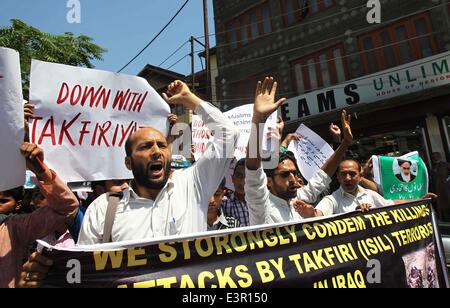 Kashmiri Shiite Muslims shout slogans during a Muharram procession in ...