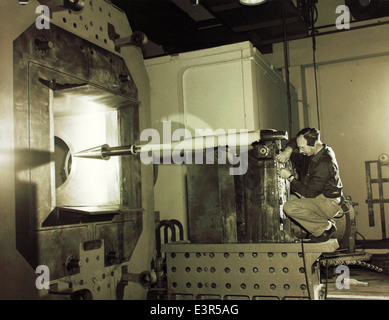This photograph from the 1960s shows engineers and personnel at Convair ...