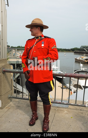 An RCMP officer in uniform during Canada Day celebrations in the Old ...