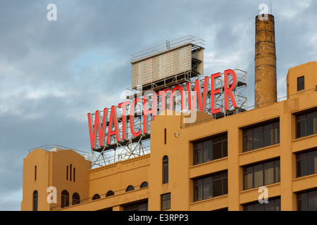 The Watchtower neon sign on the Watchtower Building in New York Stock ...
