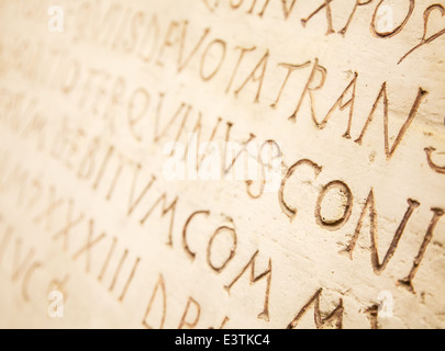 Pre-christian latin writing carved on the tombstone Stock Photo - Alamy