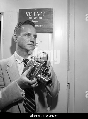 This image shows a TV cameraman capturing footage at the Hsinchu Air ...