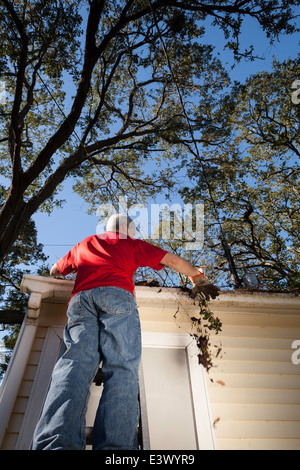 Aged man cleaning the house Stock Photo - Alamy