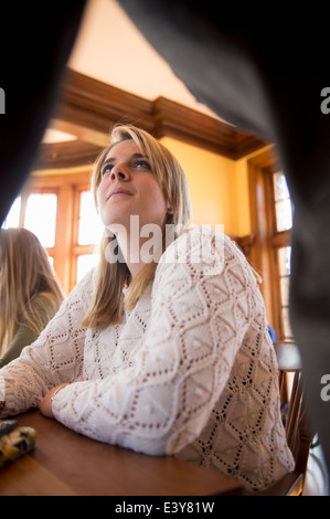 Young woman looking up Stock Photo - Alamy