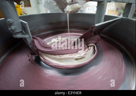 Polyester body filler mixed in a machine Stock Photo - Alamy