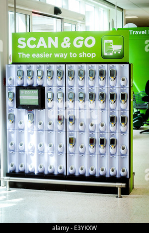 scan and go scanners in supermarket Stock Photo - Alamy