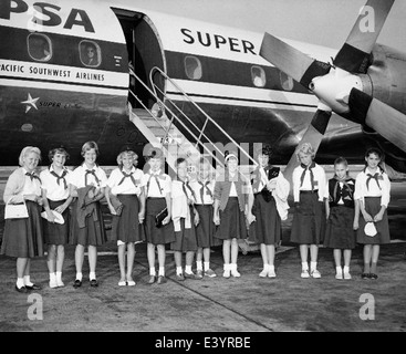 A photograph of a flight attendant aboard a Pacific Southwest Airlines ...