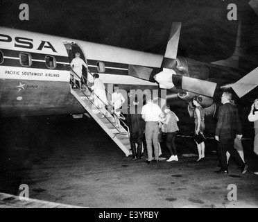 This image shows a flight attendant from Pacific Southwest Airlines ...