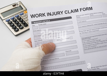 hurted hand and work injury claim form Stock Photo - Alamy