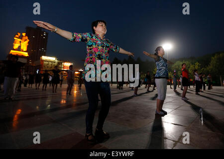Hotan, China's Xinjiang Uygur Autonomous Region. 1st July, 2014. Local ...
