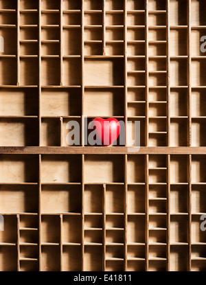 Lost in imagination. Studio shot of a young woman posing with paint on ...