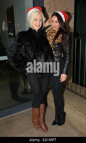 Identical twin sisters Christine and Elizabeth Mulhern stand outside ...