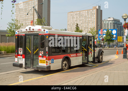 Toronto TTC Wheel-Trans Bus parked in front of an apartment building ...