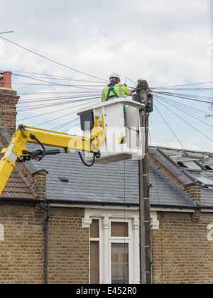 Telephone engineer working up a telegraph pole. Picture by James ...