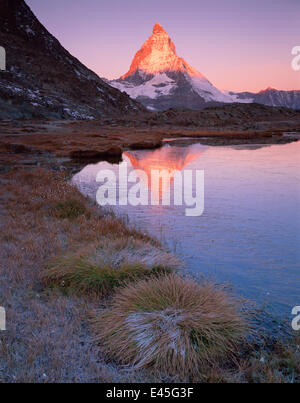 Matterhorn (4,478m) with reflection in Lake Riffel at sunrise ...