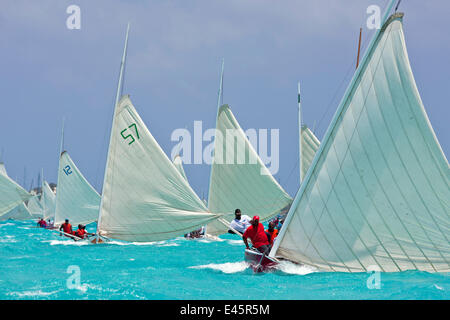 Fleet of boats racing in the Bahamian Sloop regatta, Georgetown, Exumas ...