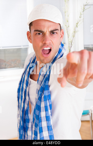 Male hand pointing with finger at music sign Stock Photo - Alamy