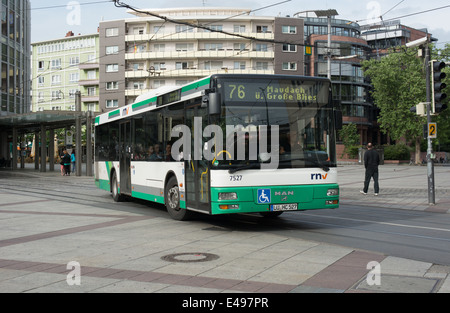 A single deck bus operated by Rhein-Neckar-Verkehr GmbH (RNV) crosses ...