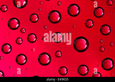 drops of red liquid in glass beaker Stock Photo - Alamy