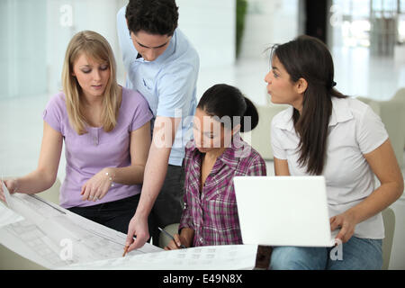 Group of engineers, architects, business partners at construction site ...
