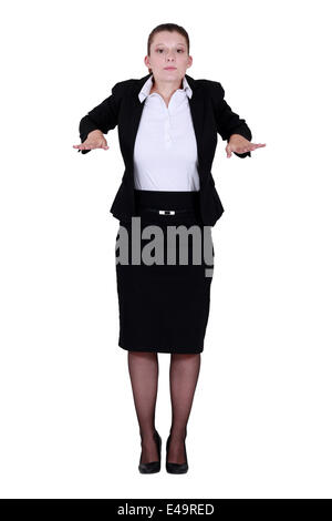 Businesswoman pushing out palm Stock Photo - Alamy