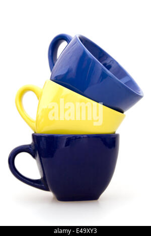 Close-up of multi-colored cups of tea Stock Photo - Alamy