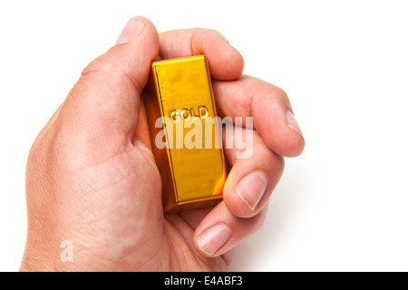 200 gram gold bar or ingot in a mans hand isolated on a white studio ...
