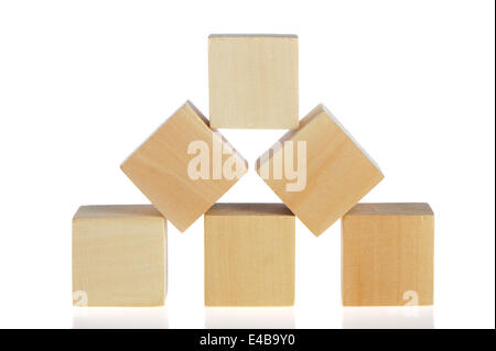 construction from wooden cubes. It is isolated on a white background ...