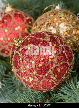 Christmas toys on branches of a fur-tree Stock Photo - Alamy