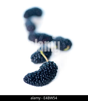 fresh ripe mulberry over white extreme closeup DOF with fork Stock ...