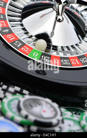 Closeup shot of a casino roulette wheel on a black surface Stock Photo ...