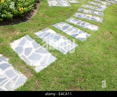 Stone path winding in a garden Stock Photo - Alamy