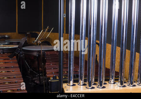 Tubular bells against the background of other percussion instruments ...