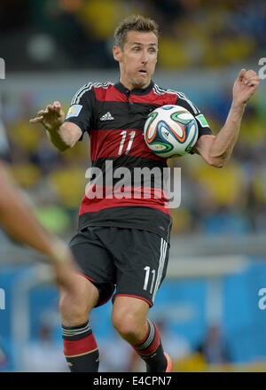 Germany's Miroslav Klose controls the ball during training at Velmore ...