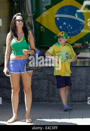 Brazilian soccer fans watch a live telecast of their team's World Cup ...