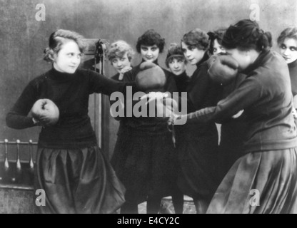 Starring in motion picture, "Gloria's Romance", 1916: boxing with woman ...