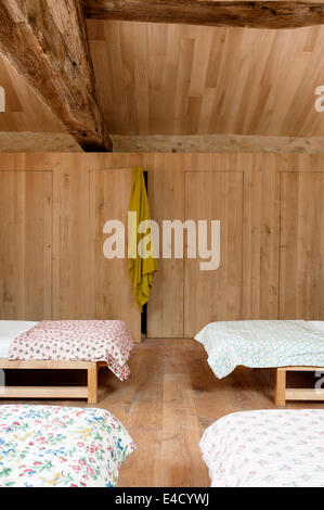 Converted open-plan barn with original timber supports, skylight and ...