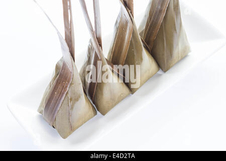 Steamed flour with coconut filling on wooden table, stock photo Stock ...